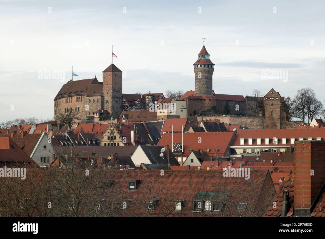 View of Nuremberg Castle from high above the red roofs, the city of ...