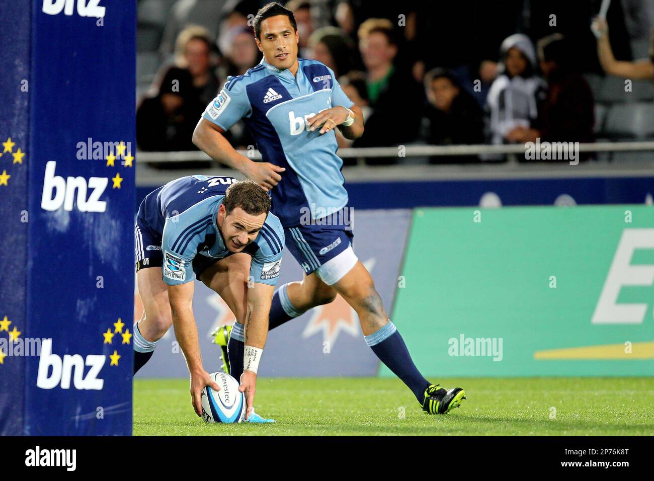 Blues' Alby Mathewson, left, scores against the Stormers in a Super ...