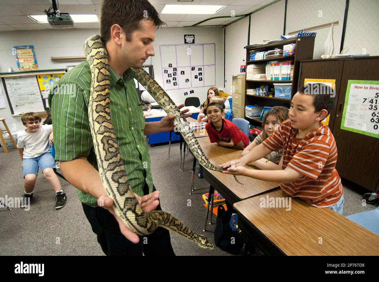 Elkton Elementary School Fourth Grade teacher Ben Markel shows ...