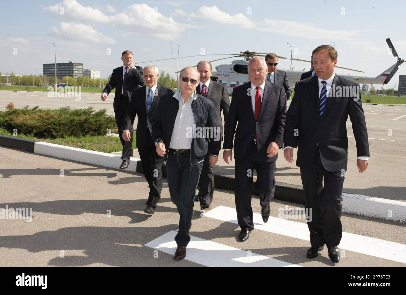 Prime Minister Vladimir Putin, right front, arrives at the Avtovaz plant, Russia's biggest car ...