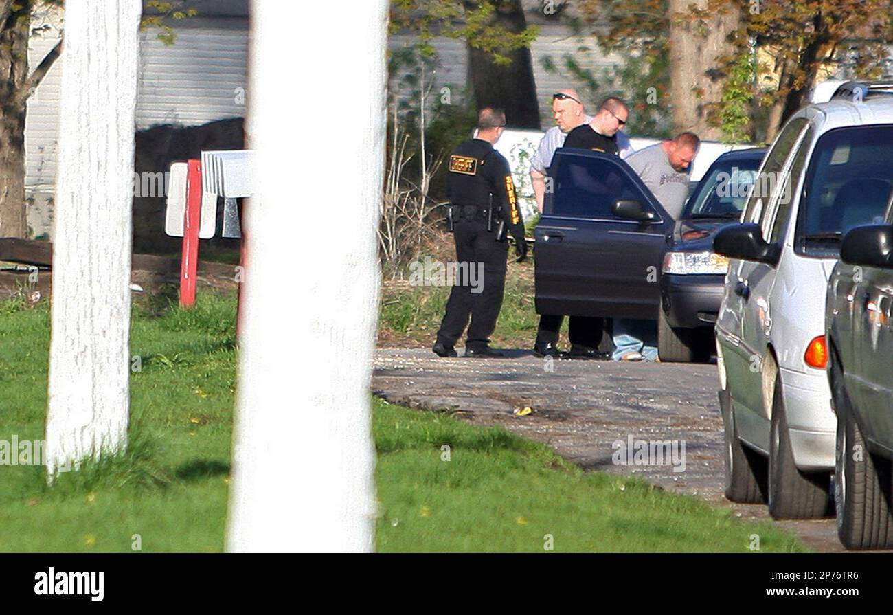 In this May 4, 2011 photo, Lake County sheriff's officers escort Riley ...
