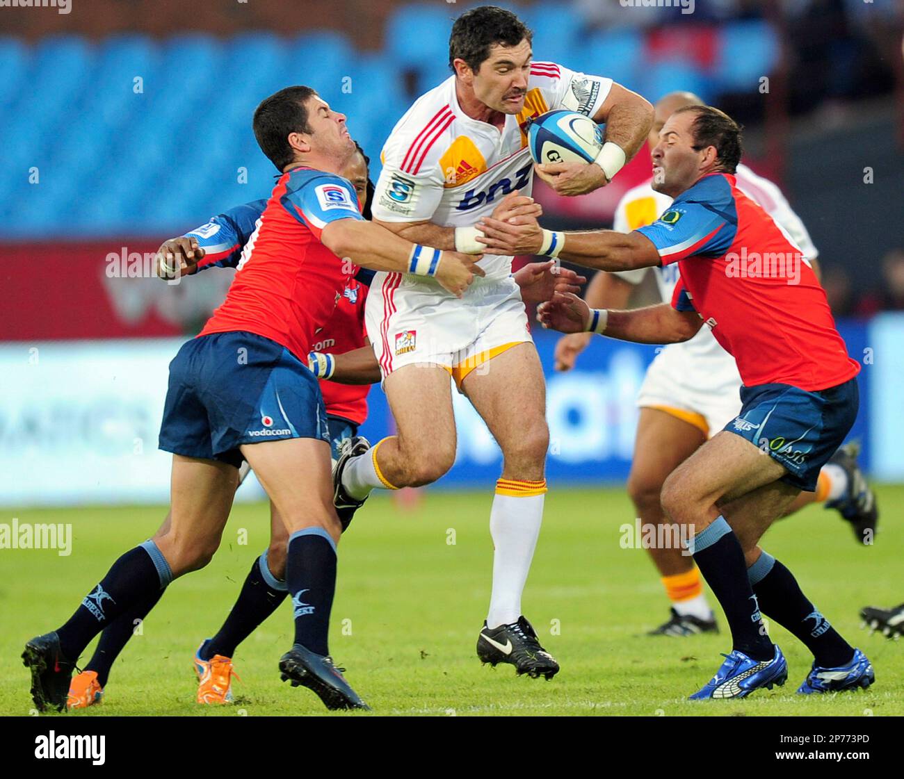 Morne Steyn of the Bulls, left, and teammate Fourie du Preez tackle ...