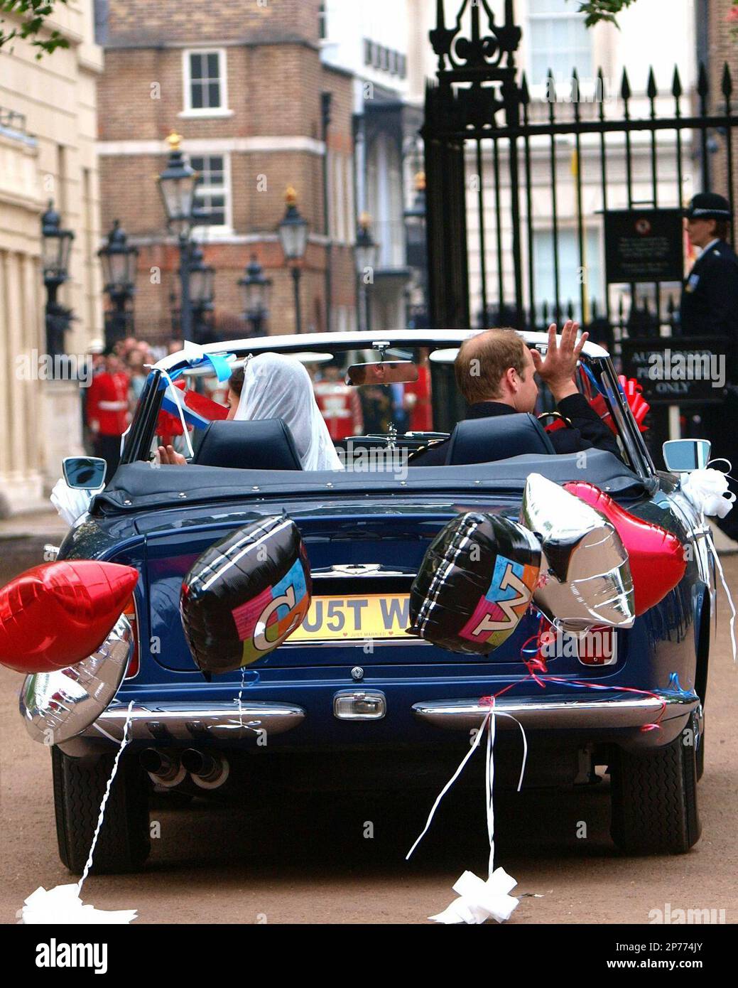 Britain's Prince William drives his wife, Kate, Duchess of Cambridge ...
