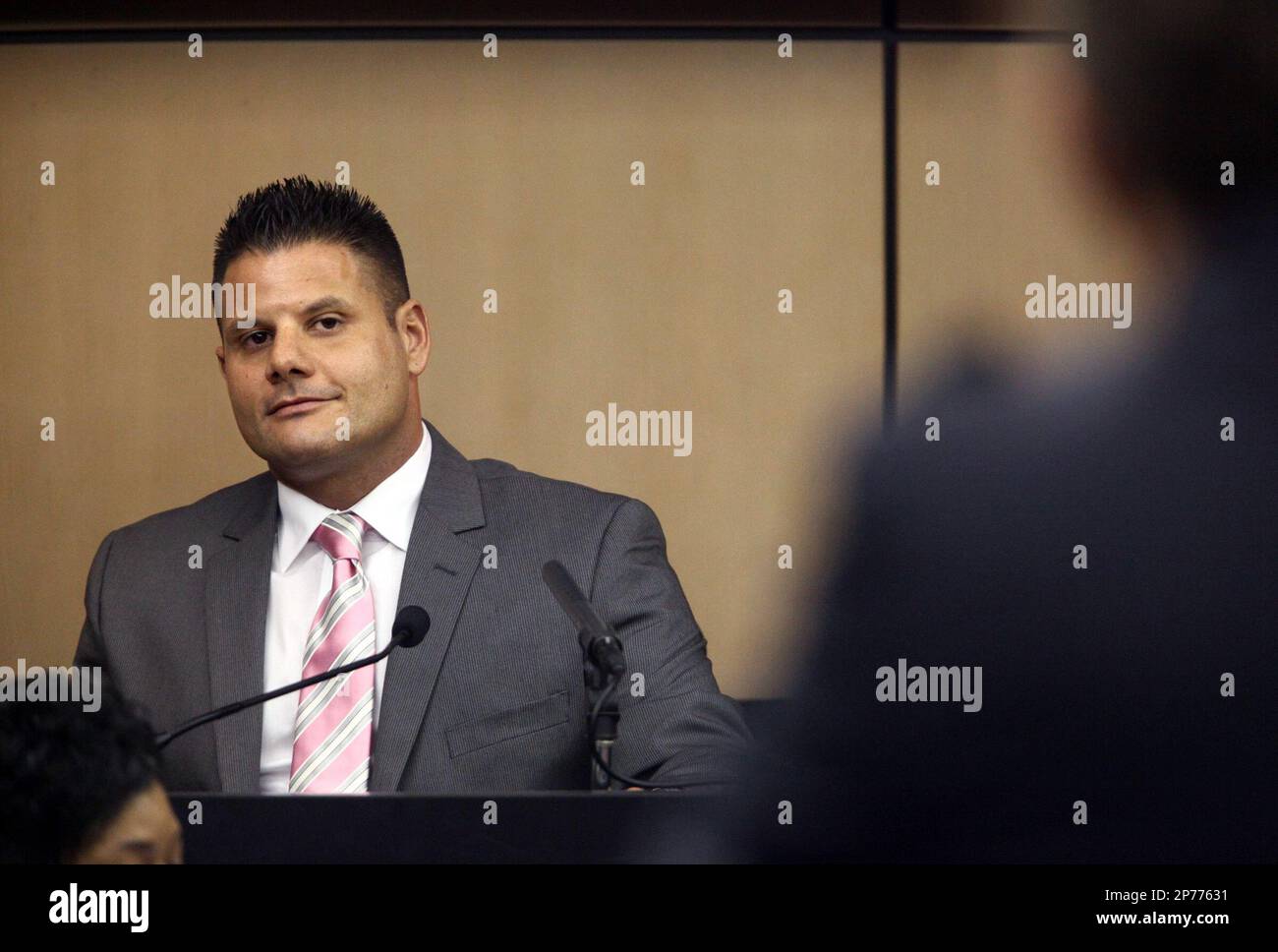 Michael Dippolito answers questions while being cross examined by ...