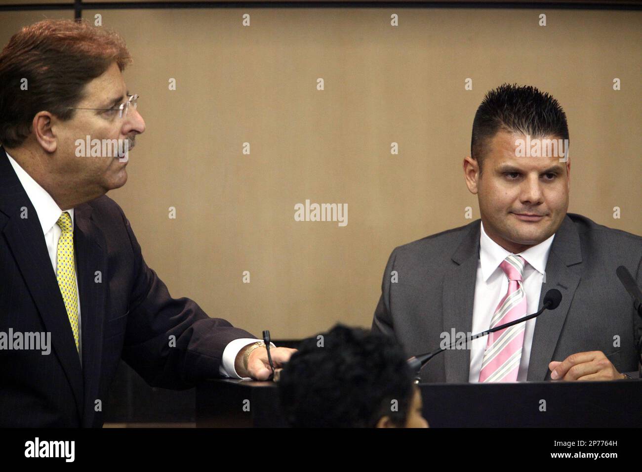 Michael Dippolito answers questions while being cross examined by ...
