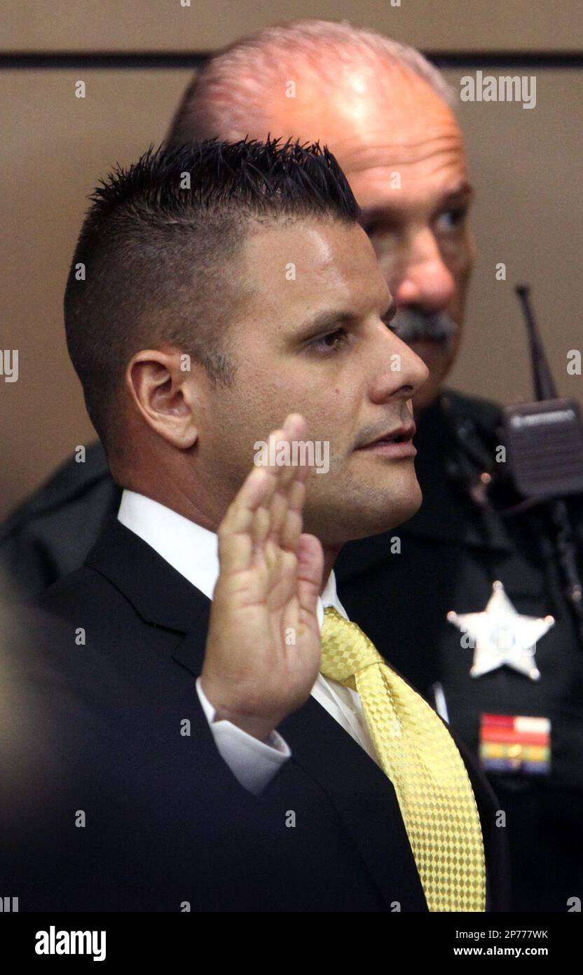 Michael Dippolito is sworn in during his wife Dalia Dippolito's trial ...