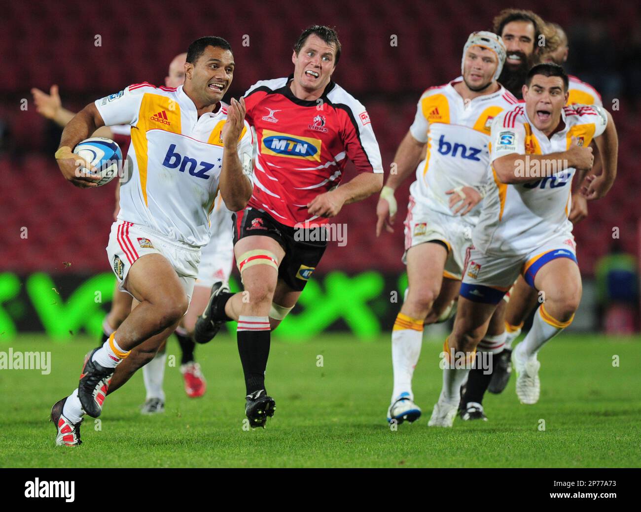 Dwayne Sweeney of the Chiefs and Richard Kahui of the Chiefs break ...