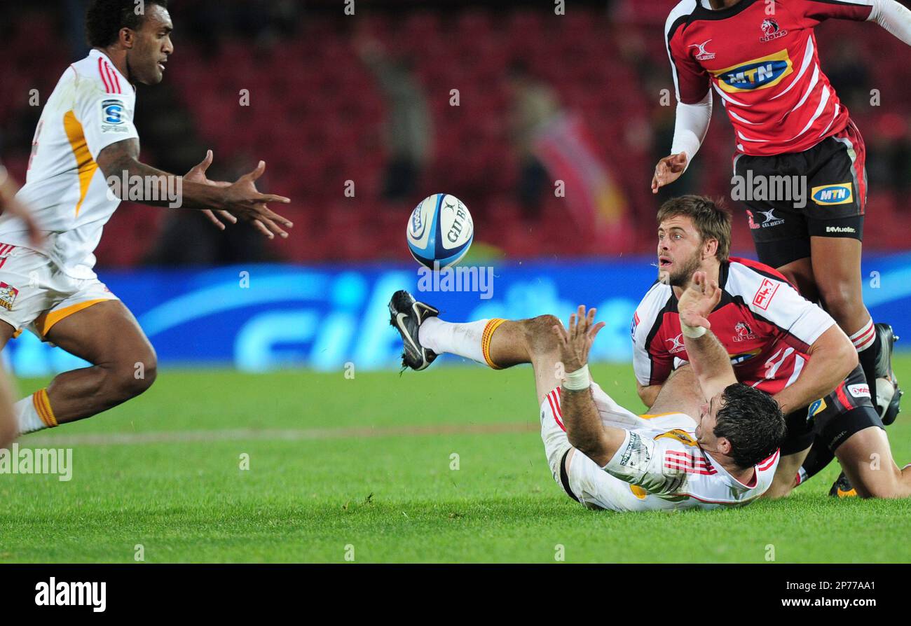Rory Kockott of the MTN Lions tackle Steven Donald of the Chiefs during ...