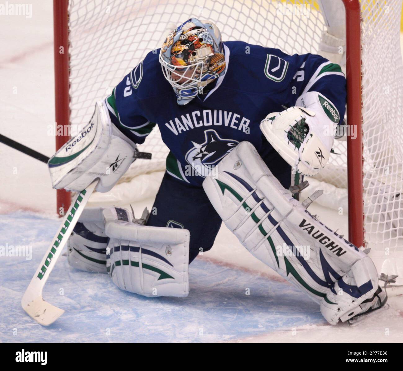 Vancouver Canucks' Cory Schneider makes a save during the third period ...