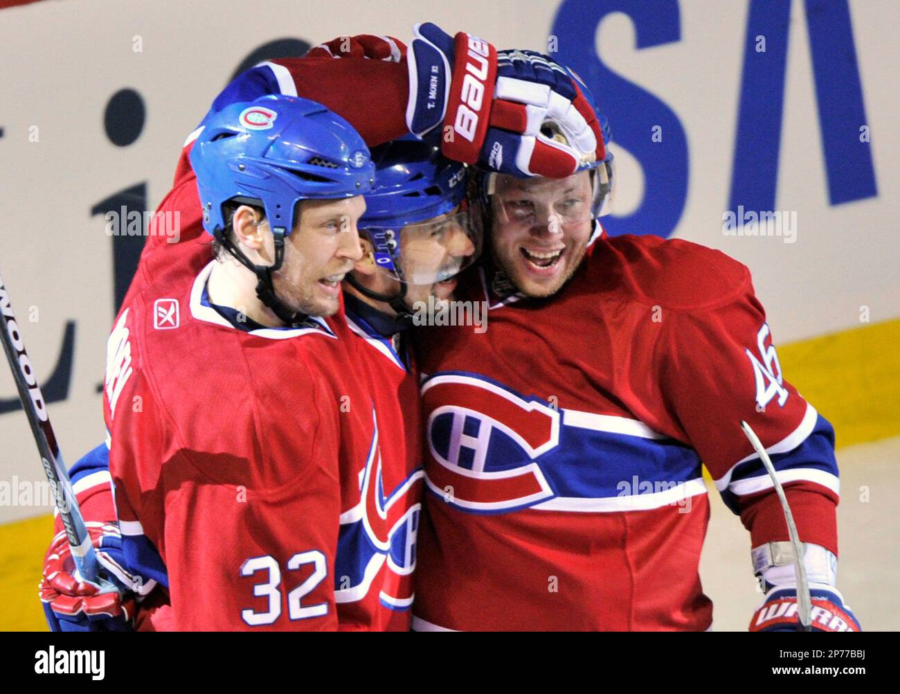 Montreal Canadiens' Travis Moen, left, and Tomas Plekanec, center ...
