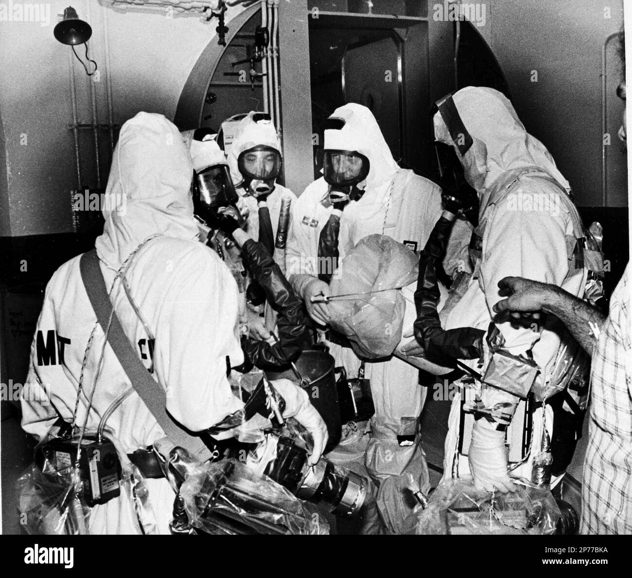 FILE - In this Oct. 16, 1980 file photo five Metropolitan Edison ...