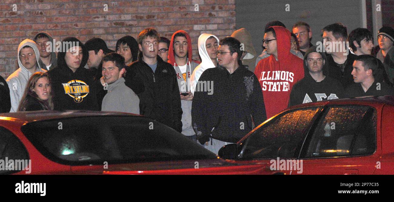 Delta Sigma Phi fraternity members watch as Normal and Bloomington ...