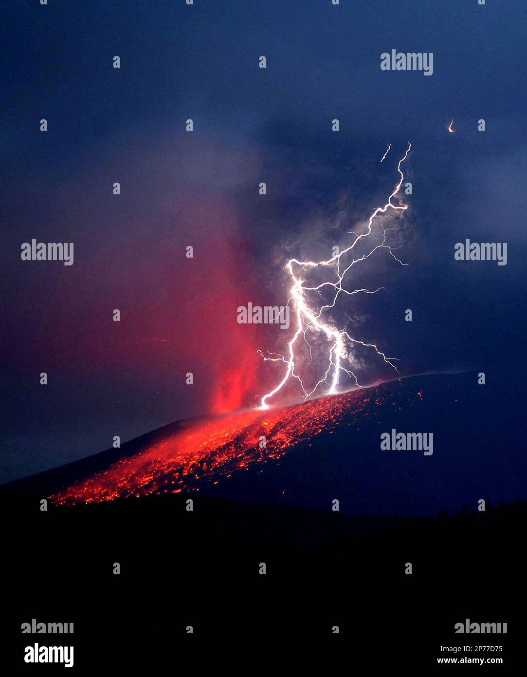 Volcanic lightning is seen above Mt. Shinmoe as it erupts in Kirishima ...
