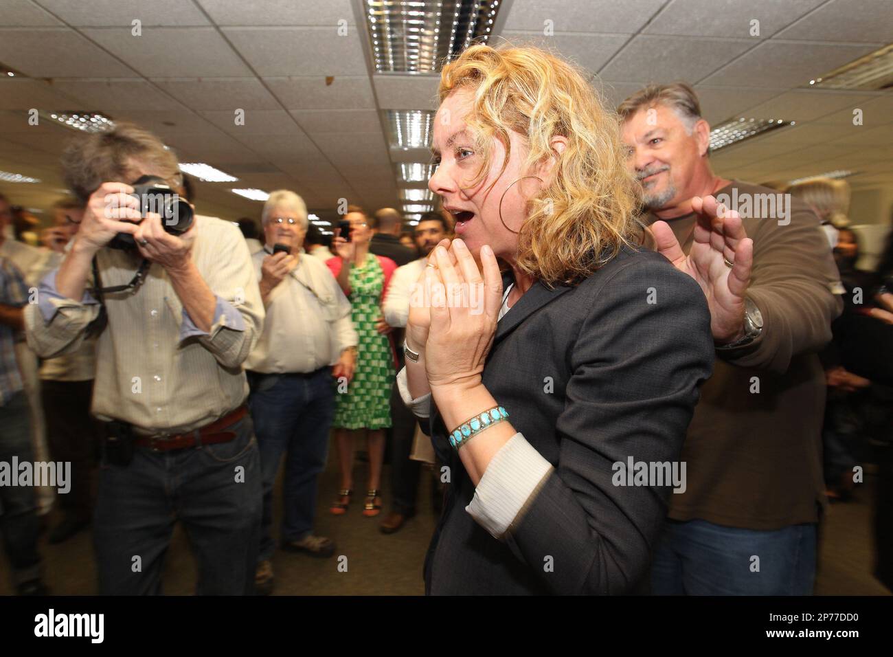 Los Angeles Times photographer Barbara Davidson reacts after hearing ...