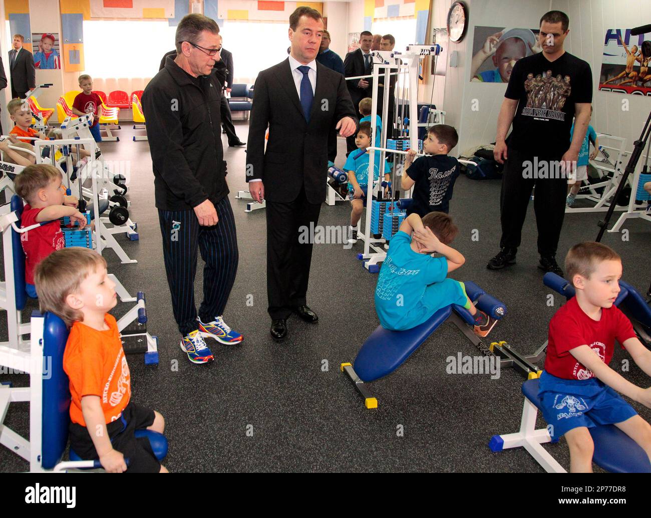 Russian President Dmitry Medvedev, center, visits a children's sports ...