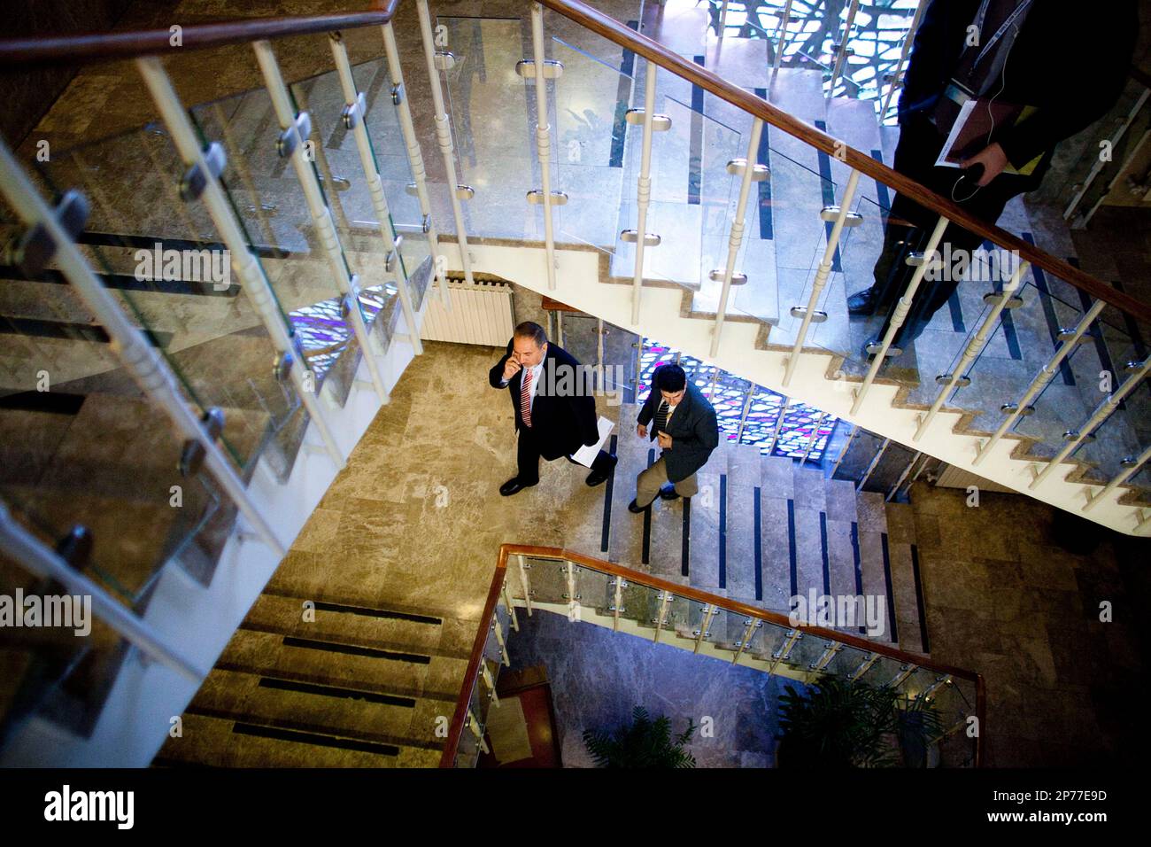 Israeli Foreign Minister Avigdor Lieberman, center left, arrives for ...