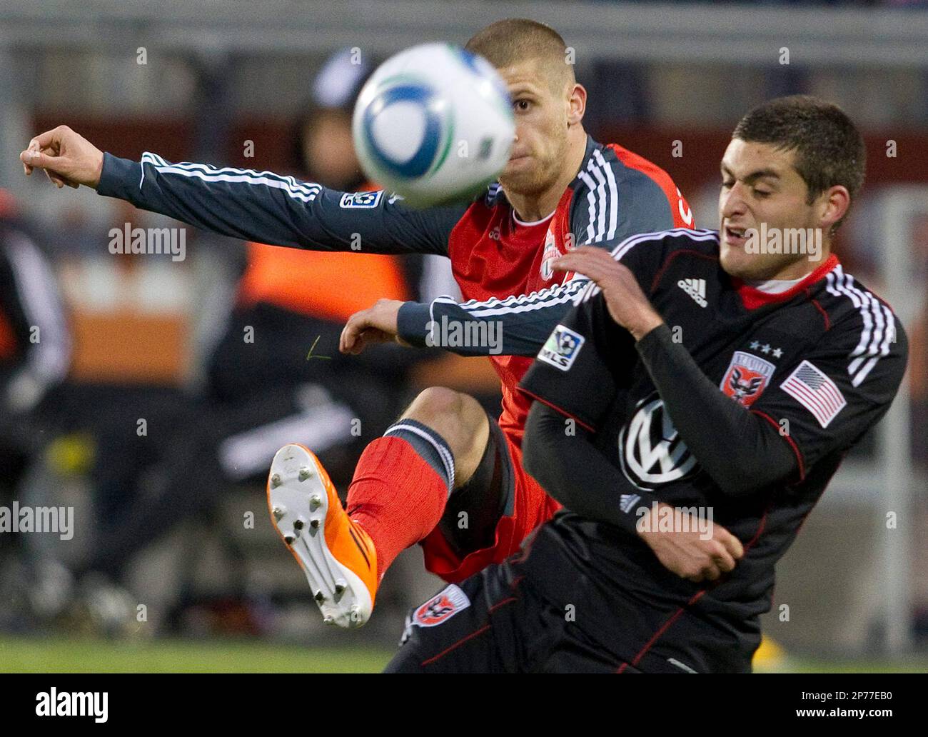 Toronto FC 's Alen Stevanovic (left) tries to curl a shot at goal ...