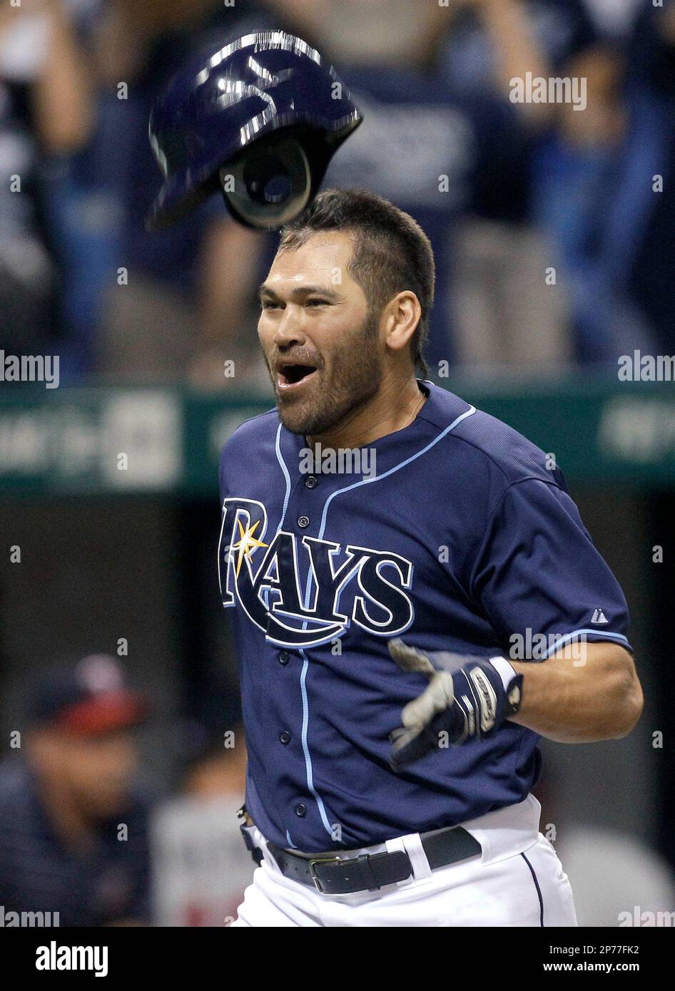 Tampa Bay Rays' Johnny Damon flips his helmet after hitting a two-run ...