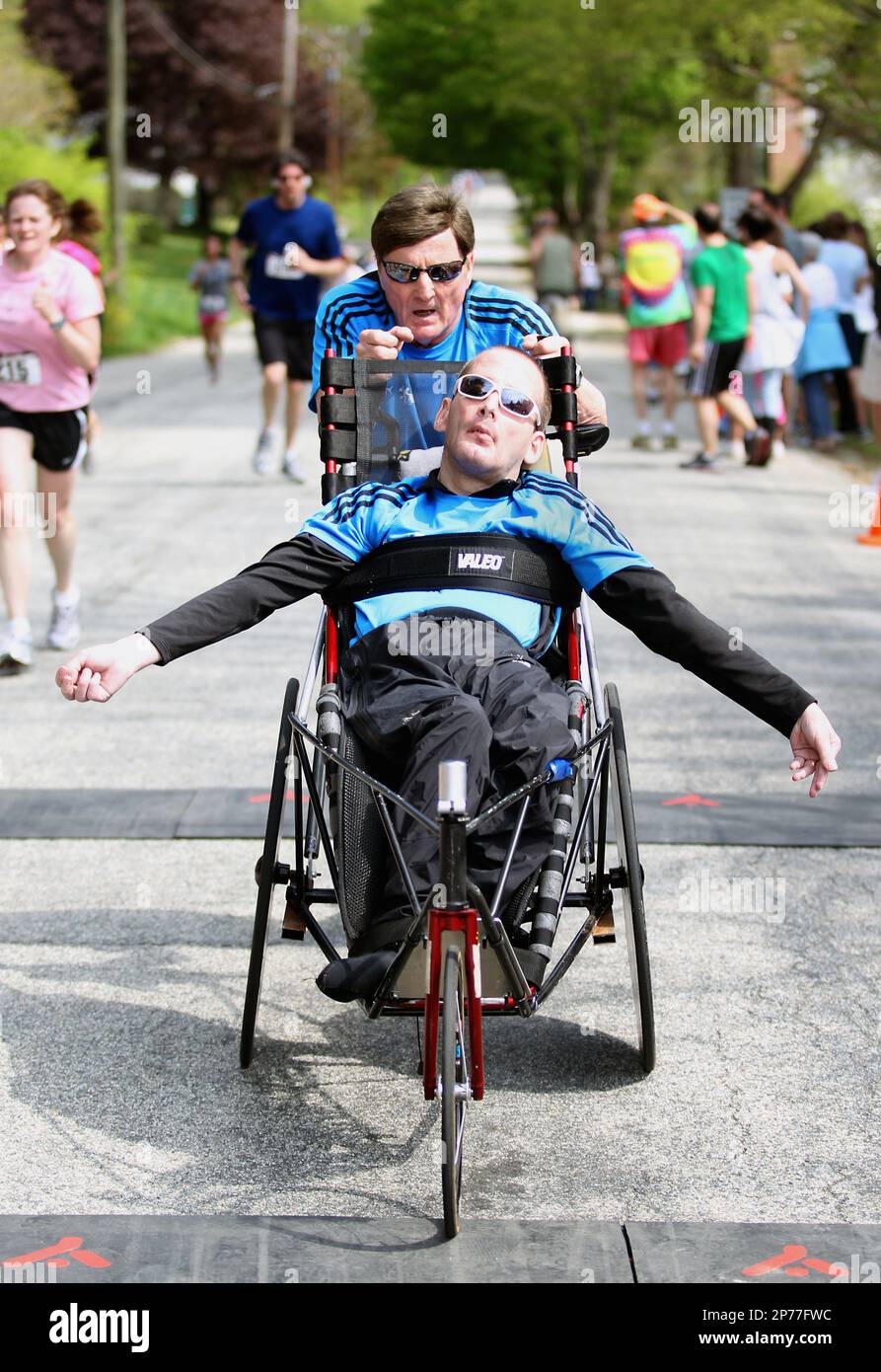Marathon: Team Hoyt: .Father Dick Hoyt and son Rick Hoyt during a 5k ...