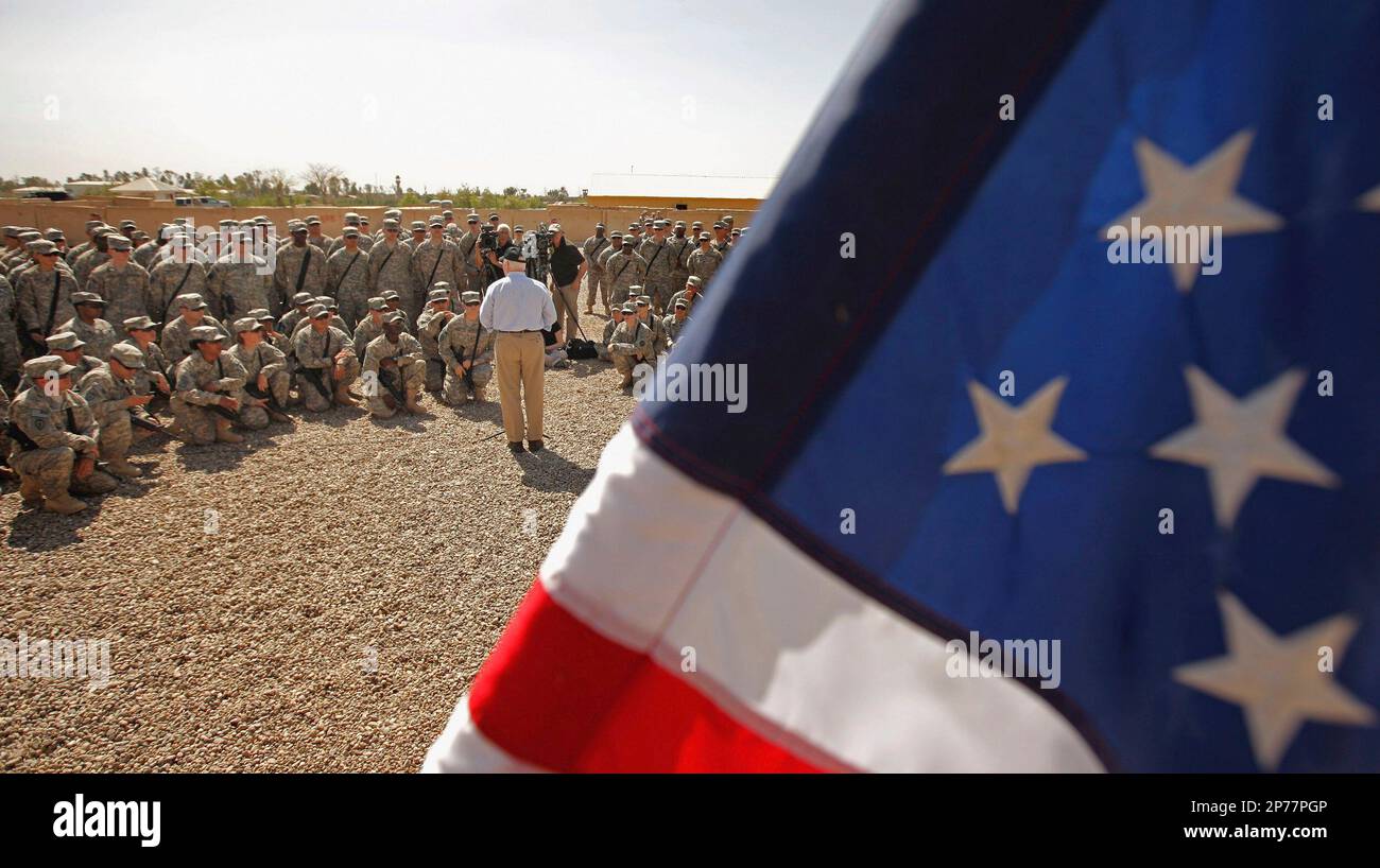 Defense Secretary Robert Gates talks with troops from the U.S. Army ...