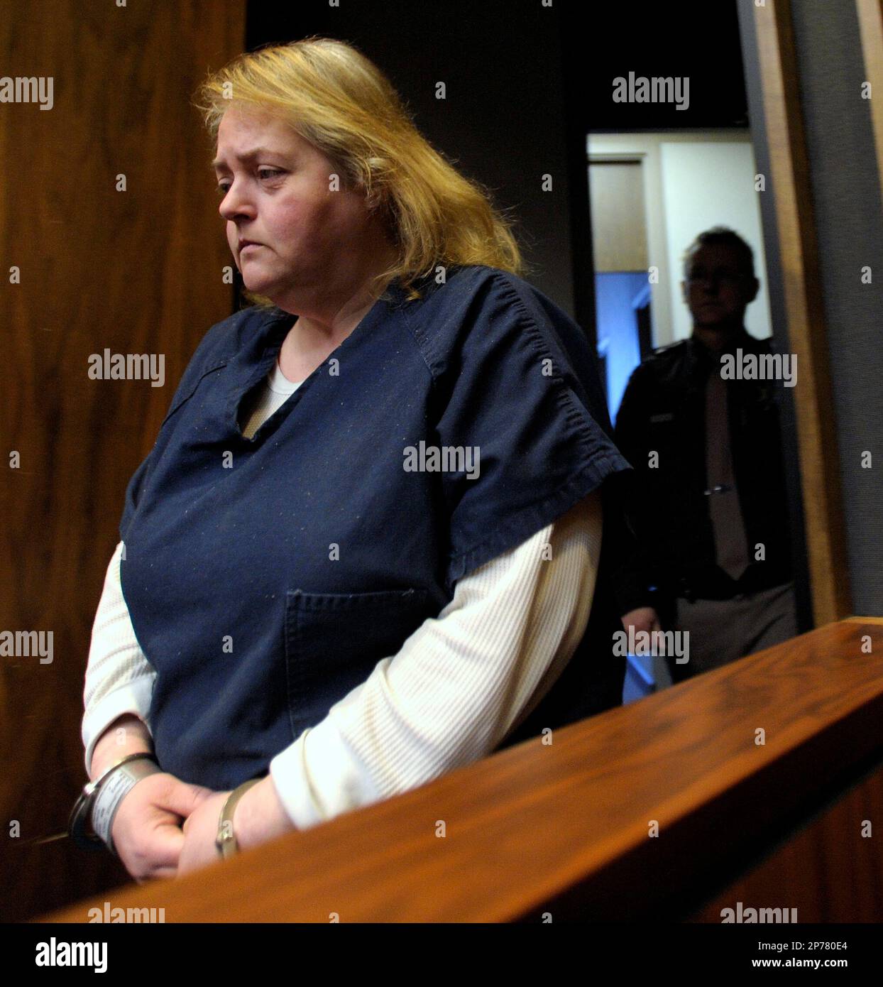 Carol Lynn Schnuphase enters the courtroom of Macomb County Circuit ...