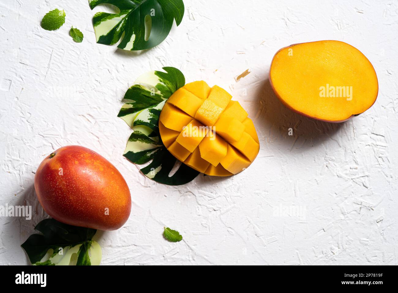 Mango background design concept. Top view of diced fresh mango fruit ...