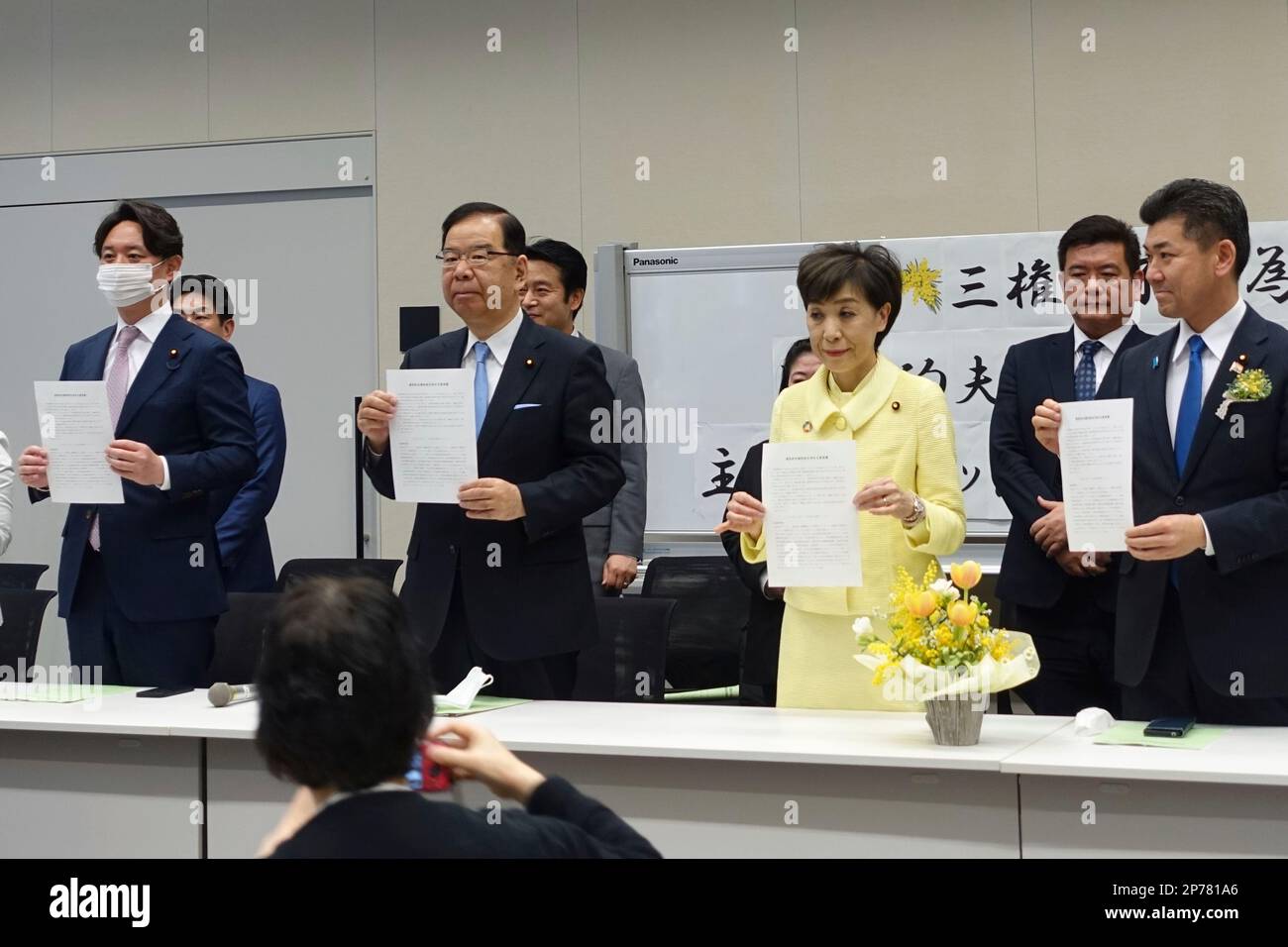 Lawmakers show copies of a joint statement submitted by representatives ...