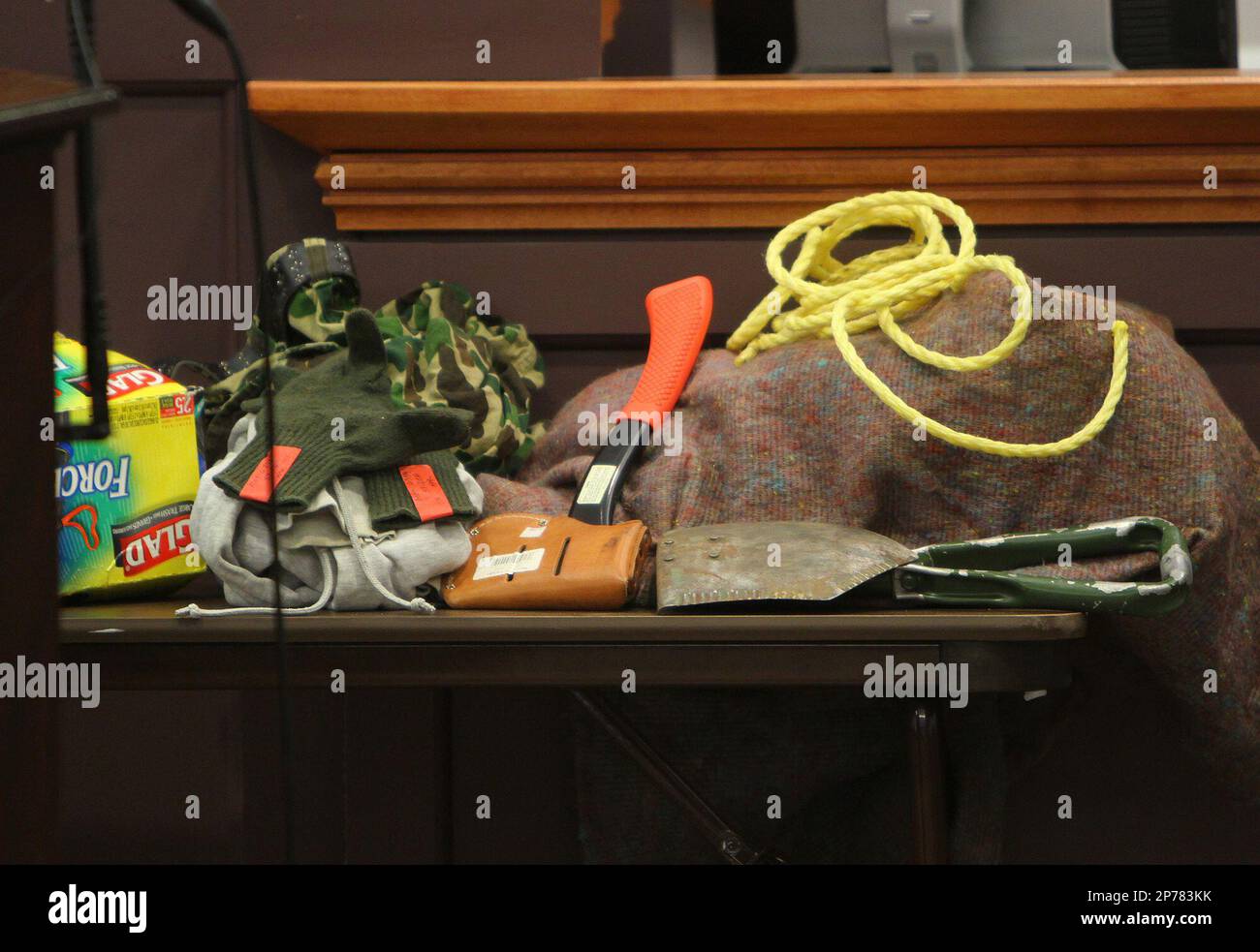 Evidence sits on a table in Hillsborough County Superior Court during ...