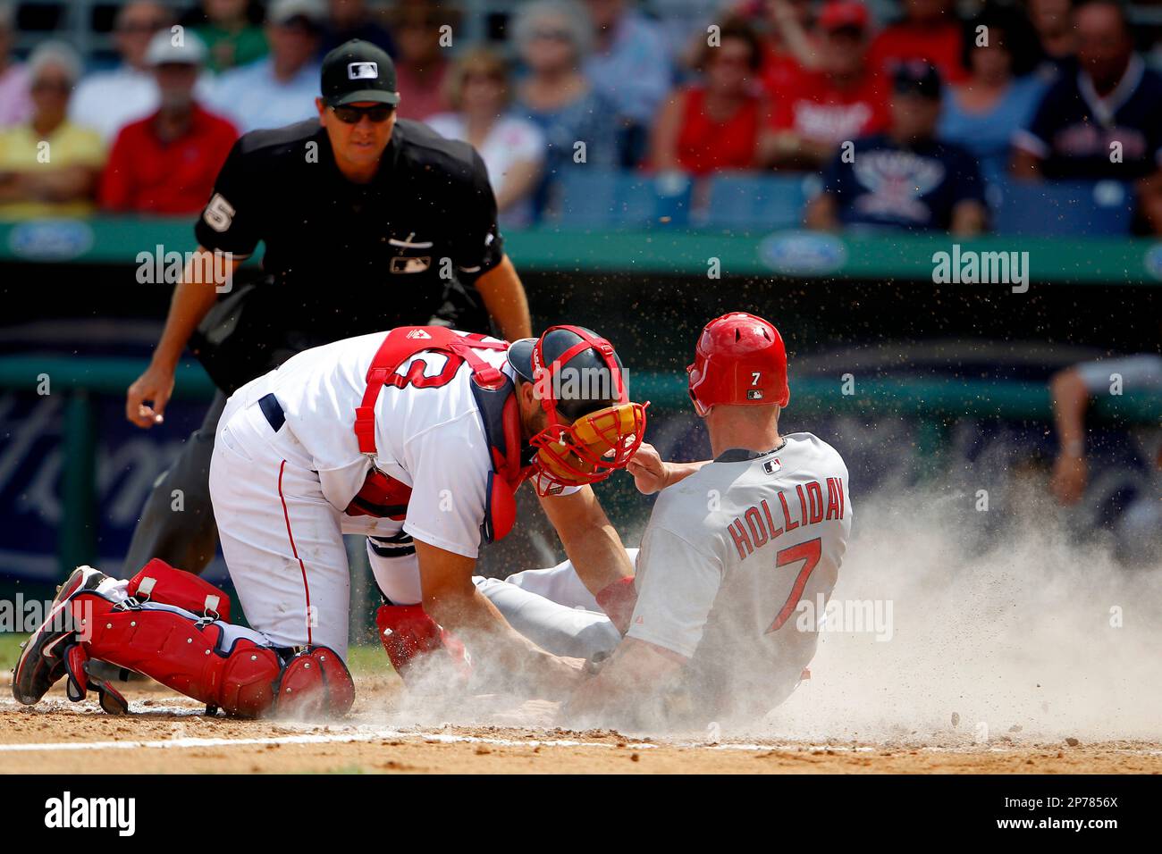 Boston Red Sox Jason Varitek trys to tag Matt Holliday the St.Louis ...