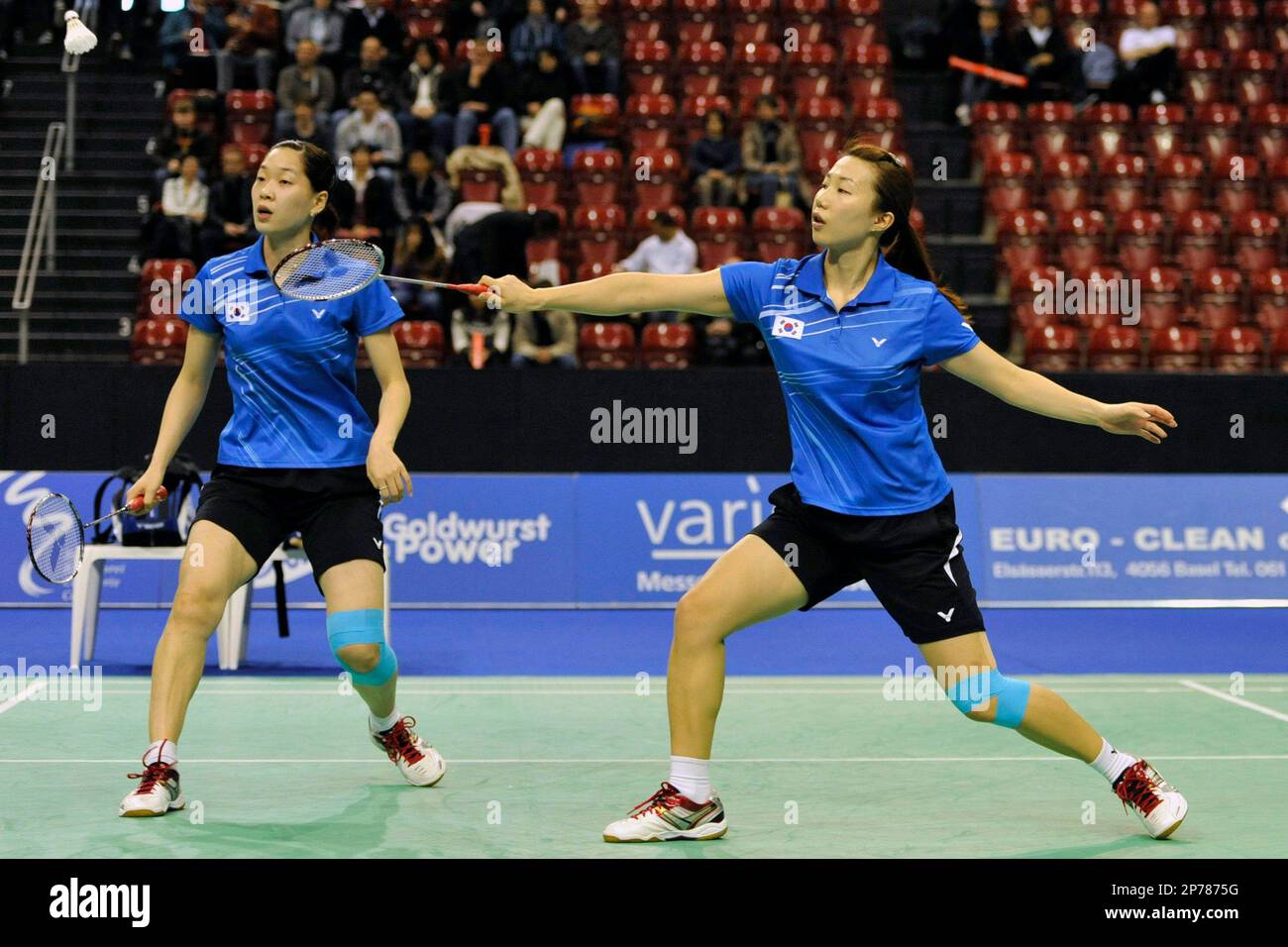 Korea's Jung Eun Ha, left, and Min Jung Kim, right, return a ...