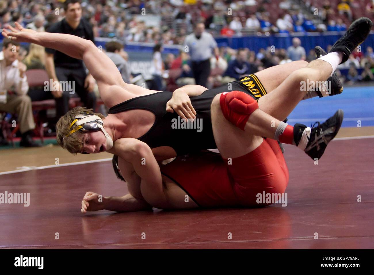 March 17, 2011: Grant Gambrall (12) from Iowa in action against Corey ...