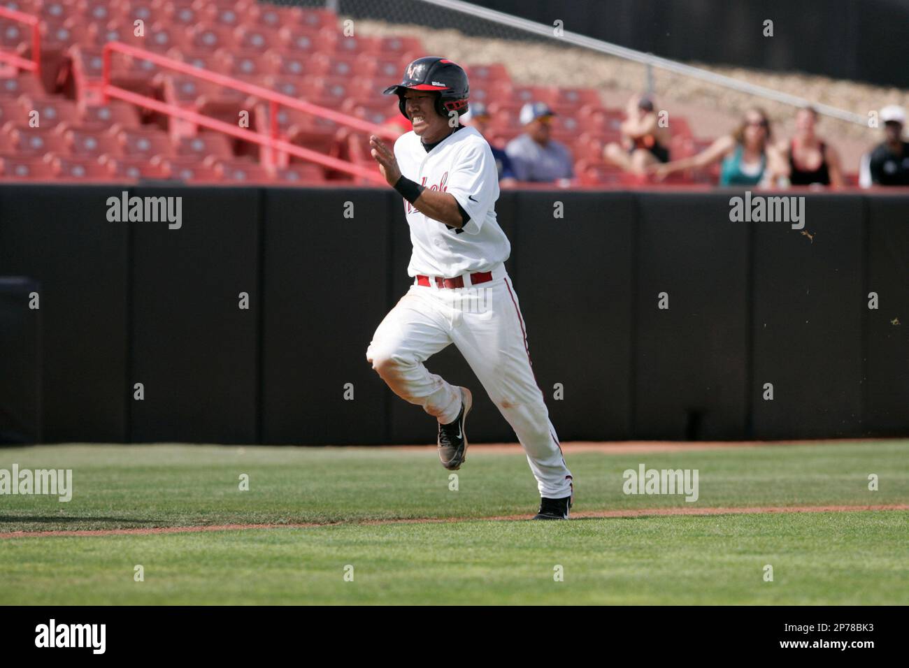 22011 MAR 13: UNLV's Danny Higa (4) scores the winning run during an ...