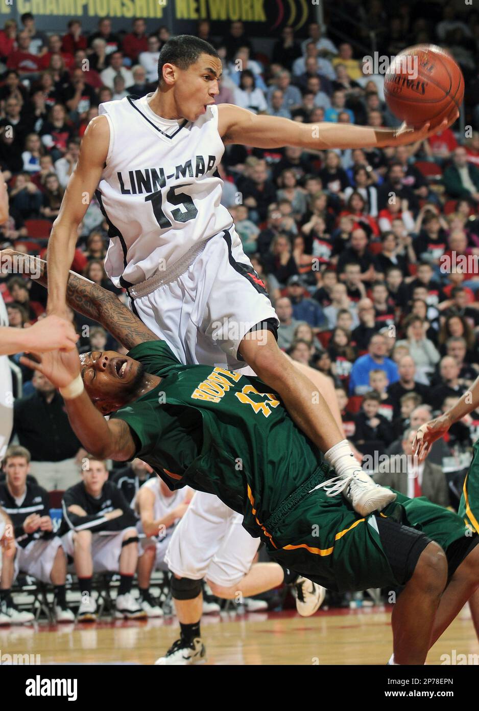 Linn-Mar Marion's Marcus Paige crashes into Des Moines Hoover's Reggie ...