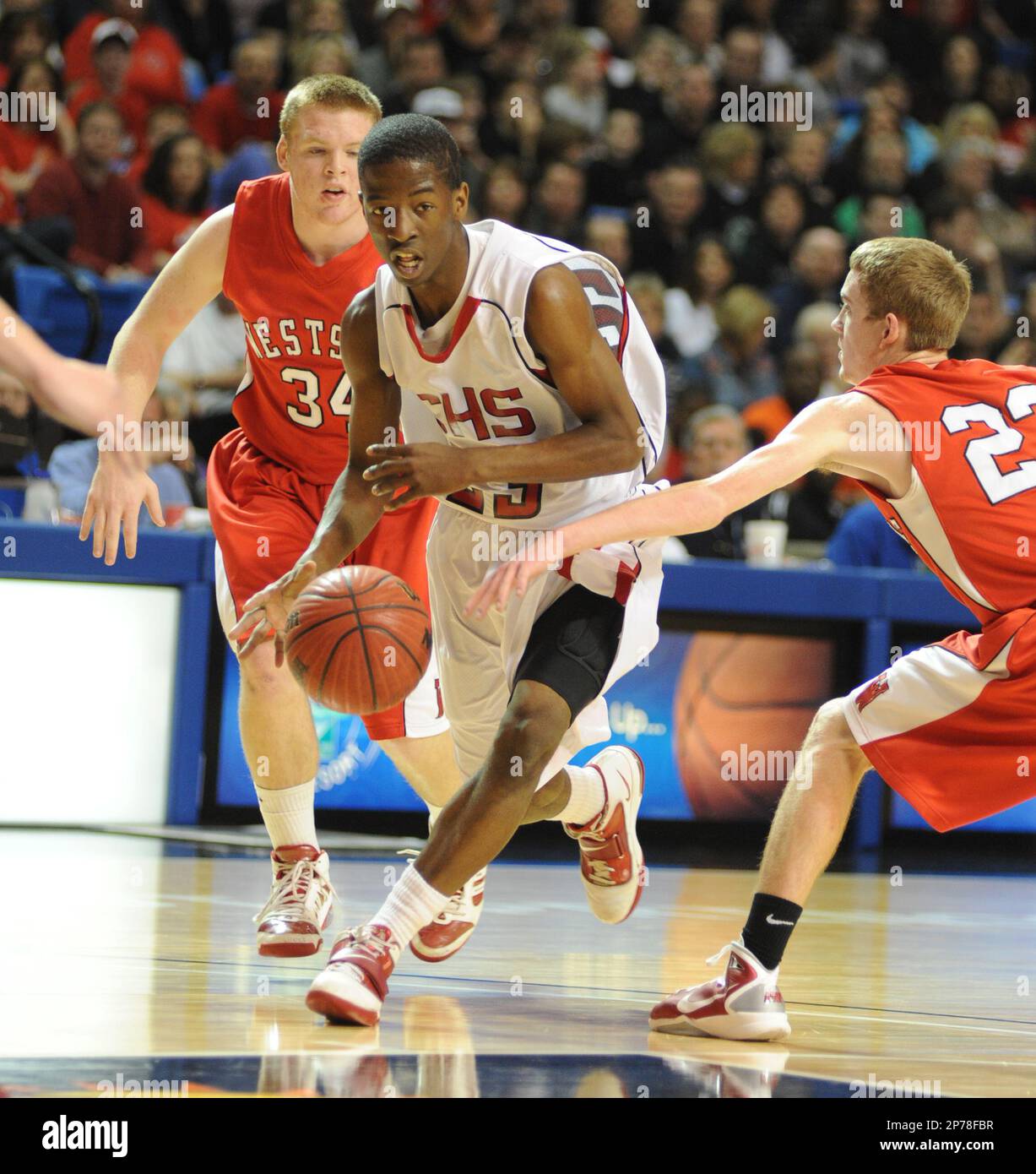 Clarksville's Dederick Lee (23) drives the ball as Jonesboro Westside's ...