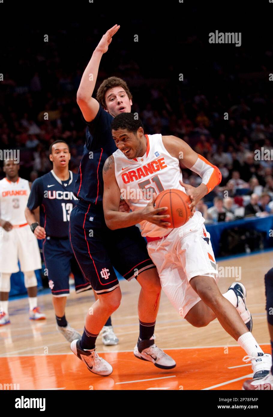 March 11 2011: Syracuse's forward Fab Melo (51) drives toward the ...