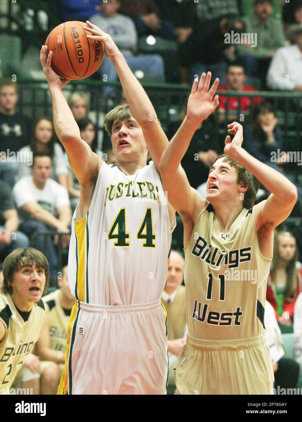 Great Falls CMR's Cody Clausen goes up for a shot over Billings West's ...