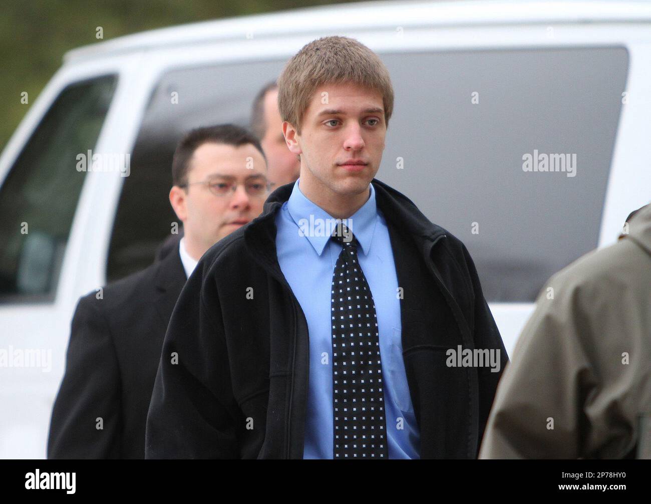 Christopher Gribble walks in front of the Cates home in Mont Vernon, N ...