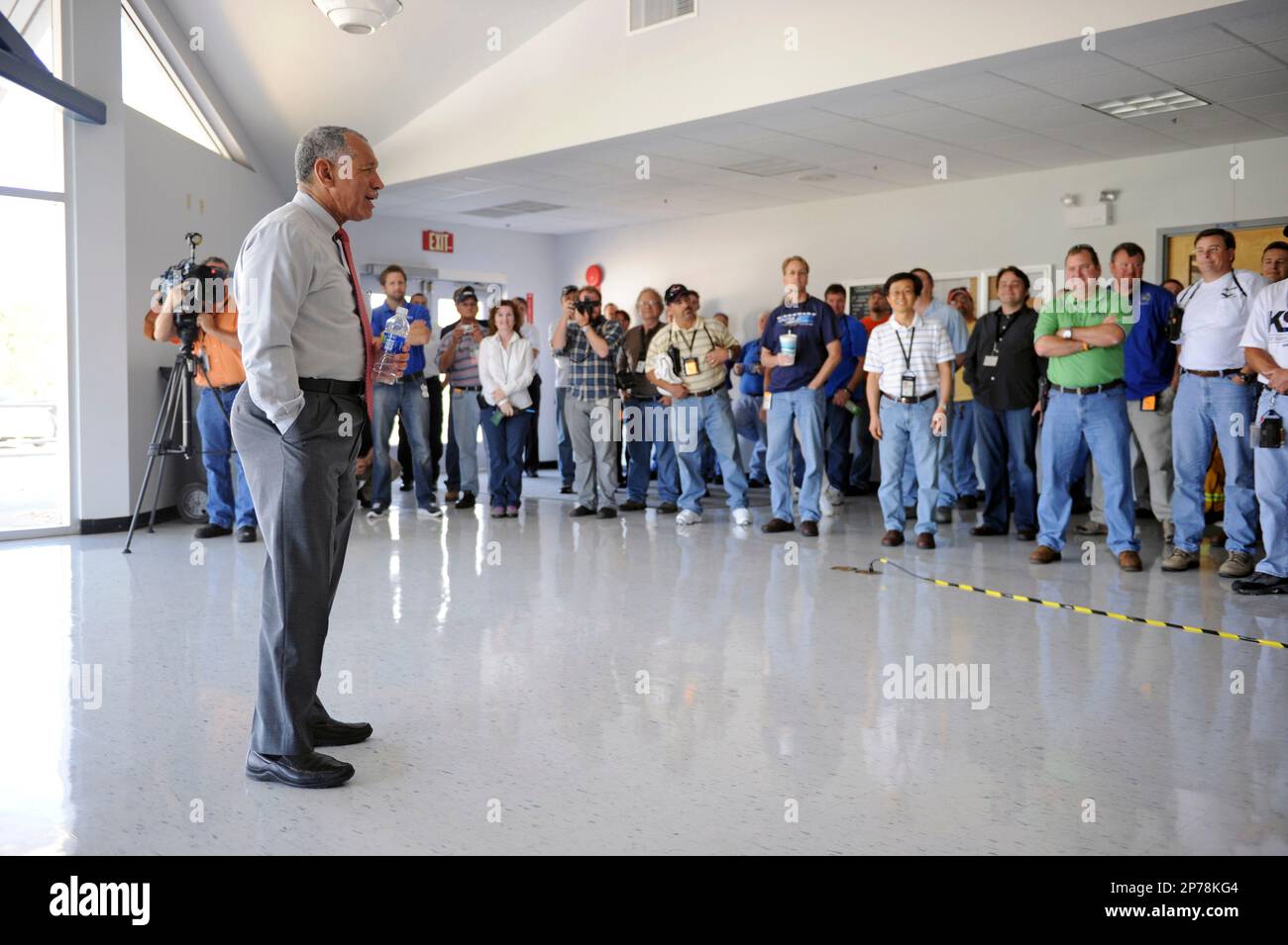 NASA Administrator Charles Bolden, front left, briefs NASA landing crew ...