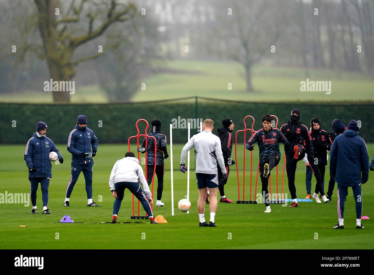 Arsenal manager Mikel Arteta (left) during a training session at the ...