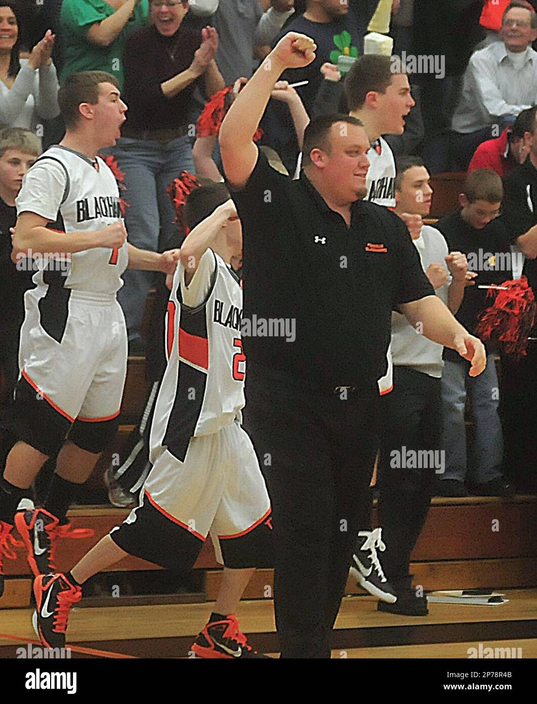 Fennville Head Coach Ryan Klingler celebrates as his team clinches a ...