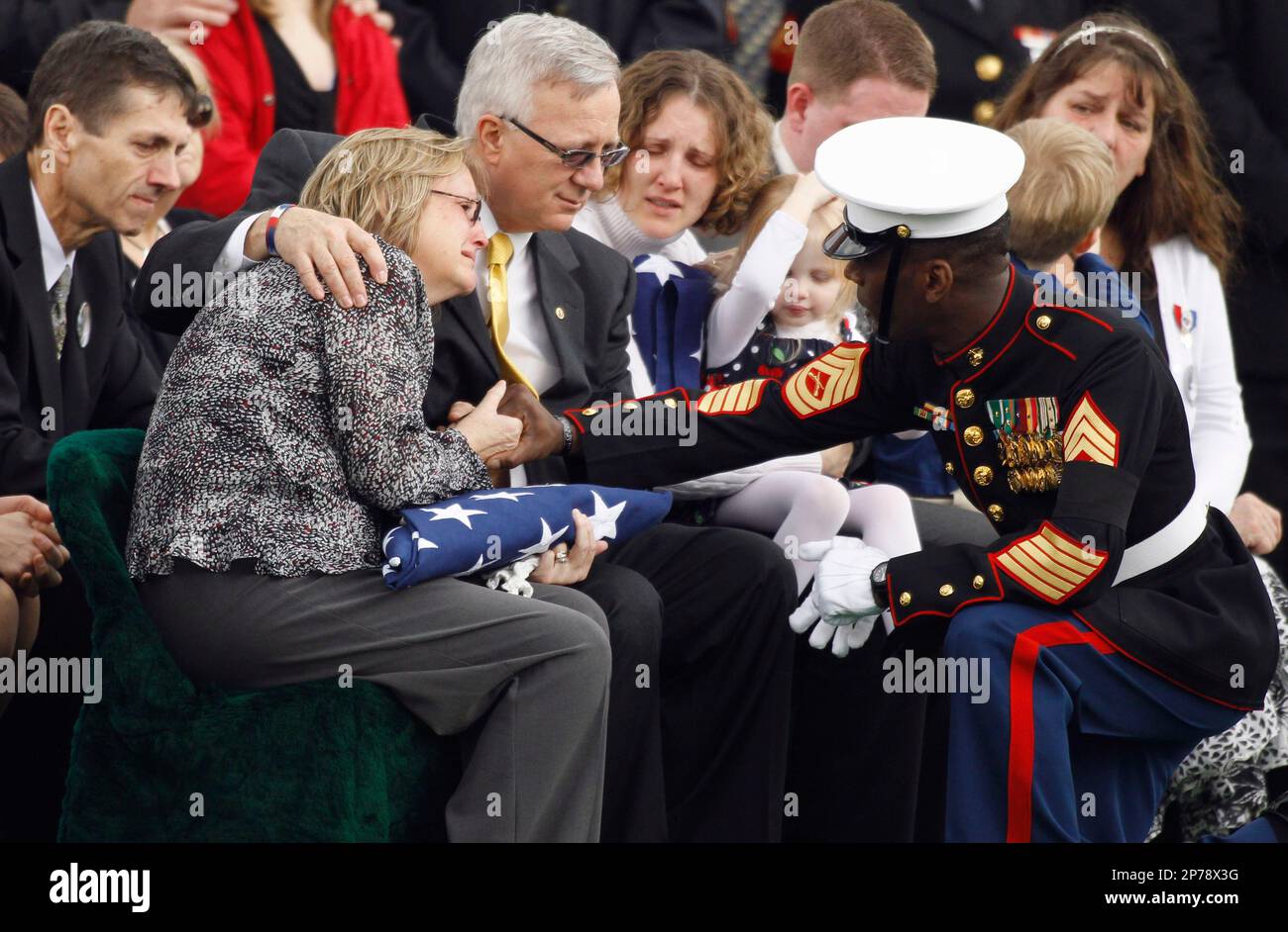 Marine Corps Funeral Director Gunnery Sgt. William J. Dixon, right ...