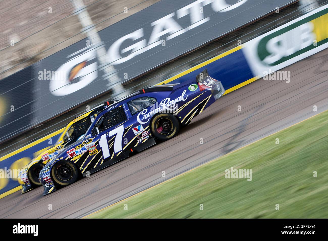 Avondale, AZ - FEB 27, 2011: Matt Kenseth (17) races down the back ...
