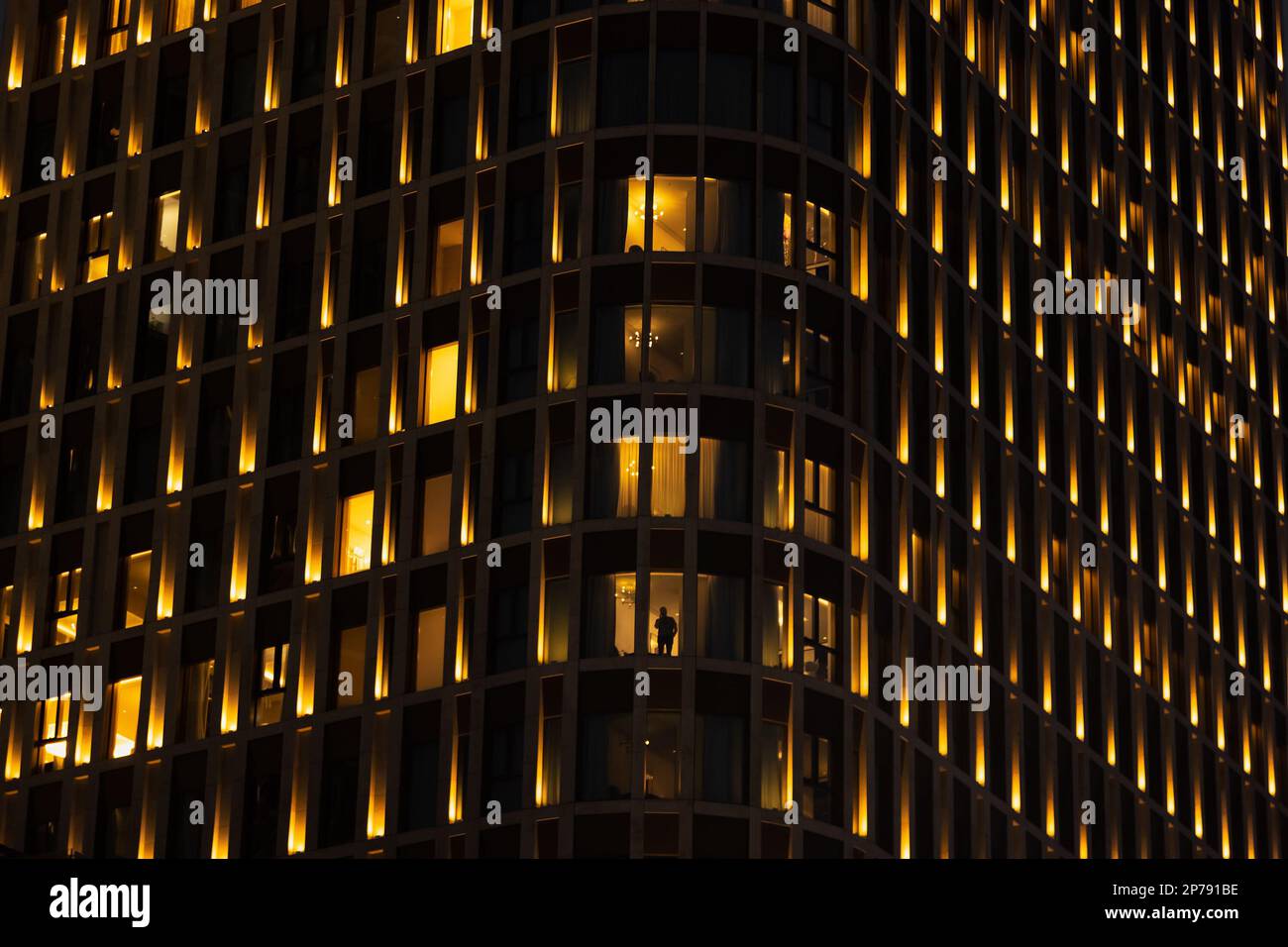 View of the beautifully illuminated facade of the building at night ...