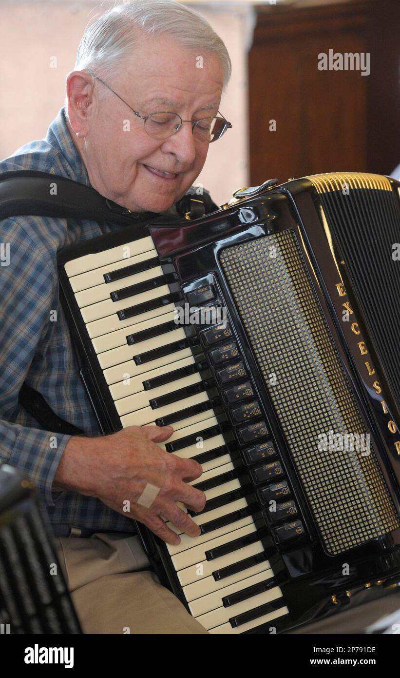 In this Feb. 12, 2011 photo, Karl Kment smiles while playing his ...