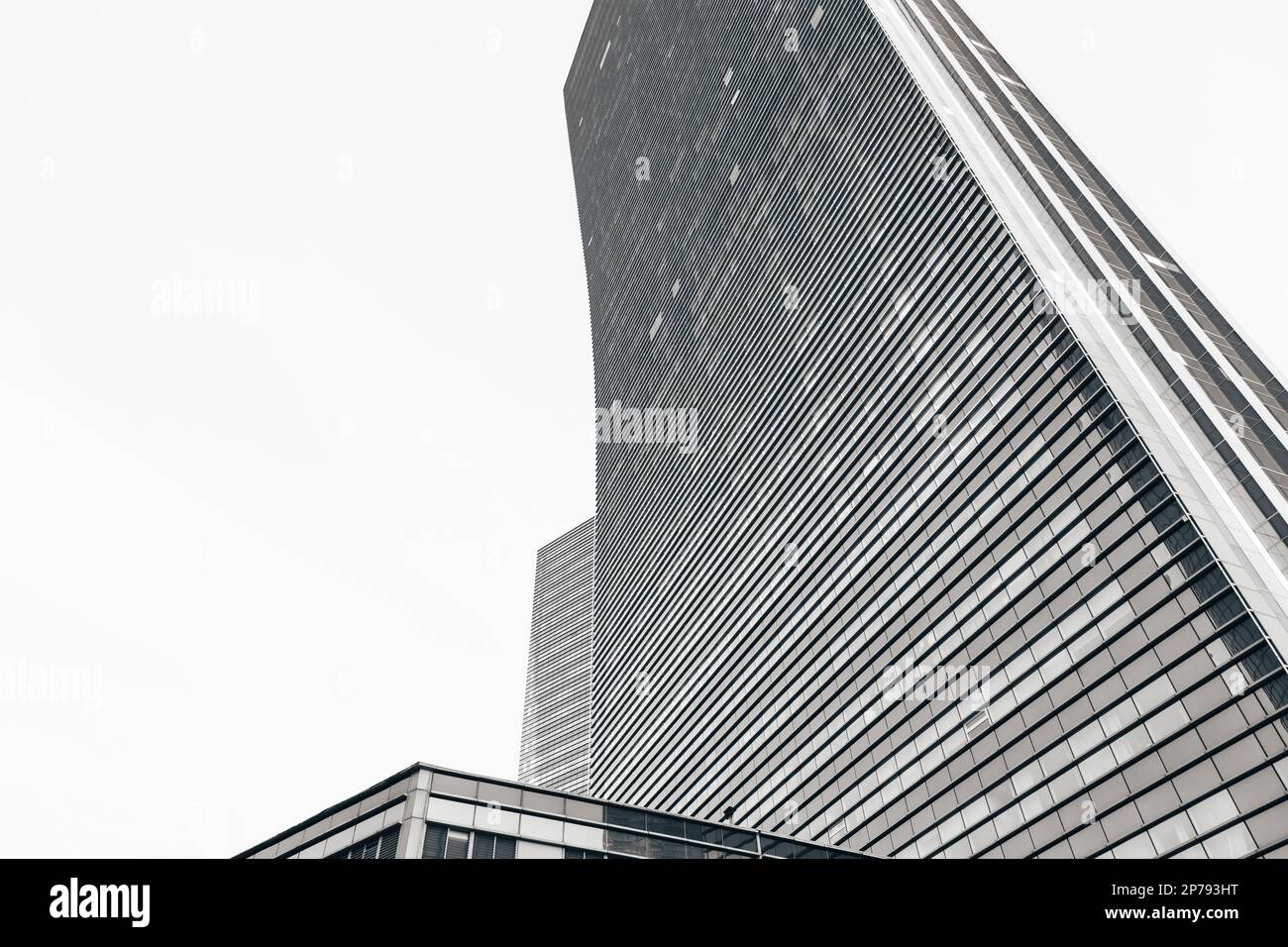 The geometry of modern urban architecture is reflected in the glass ...