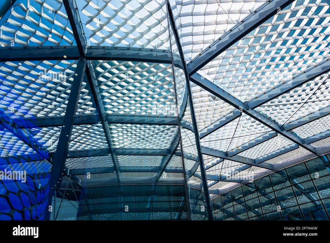 The geometry of modern urban architecture is reflected in the glass ...