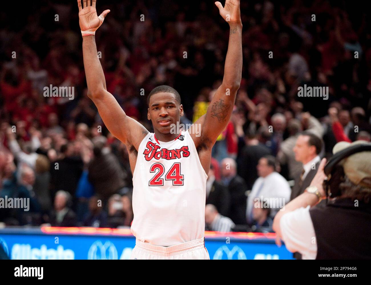 February 19 2011: St. John's forward Justin Burrell (24) raises his ...