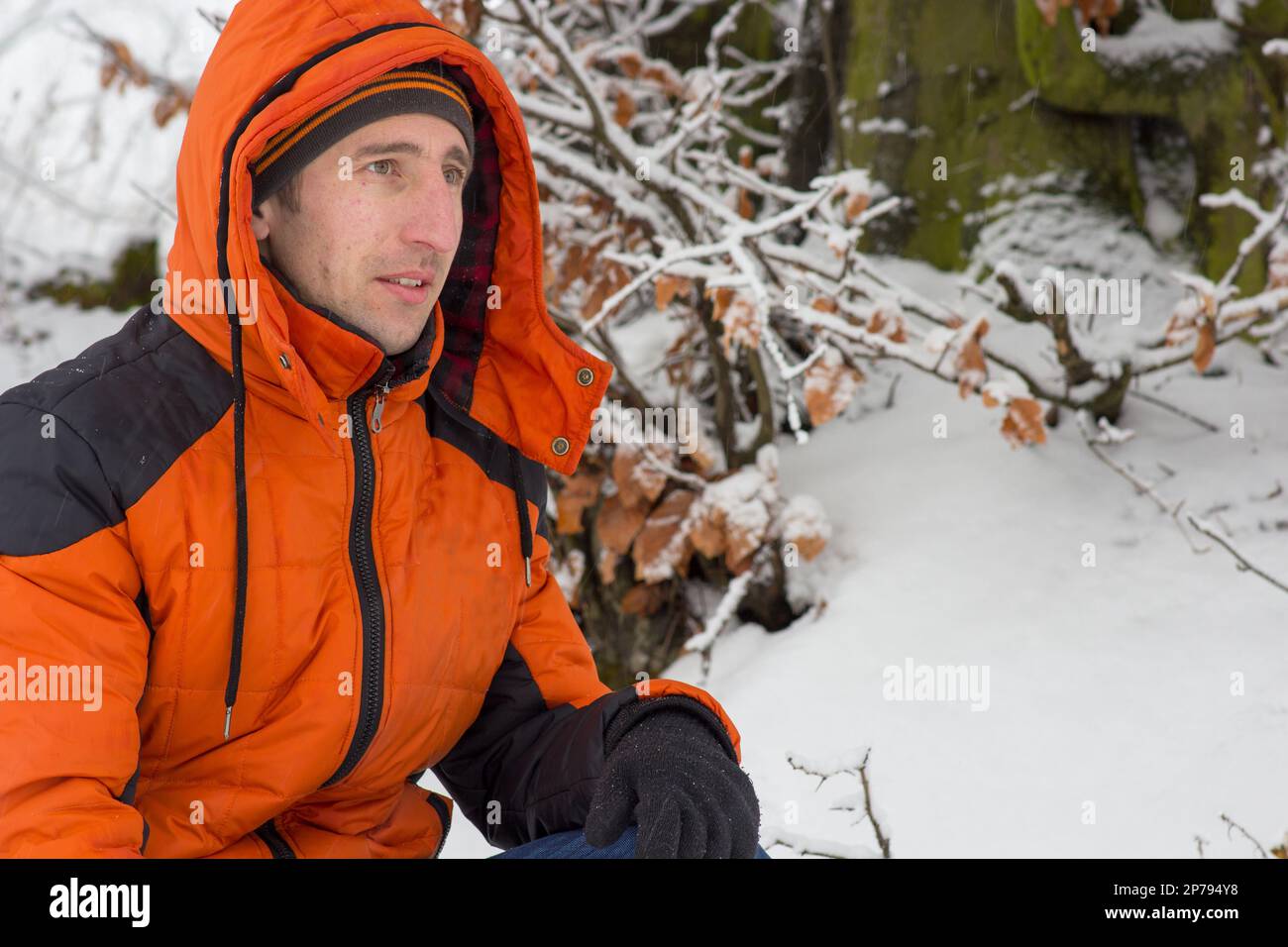 Male model posing in snow hi-res stock photography and images - Alamy