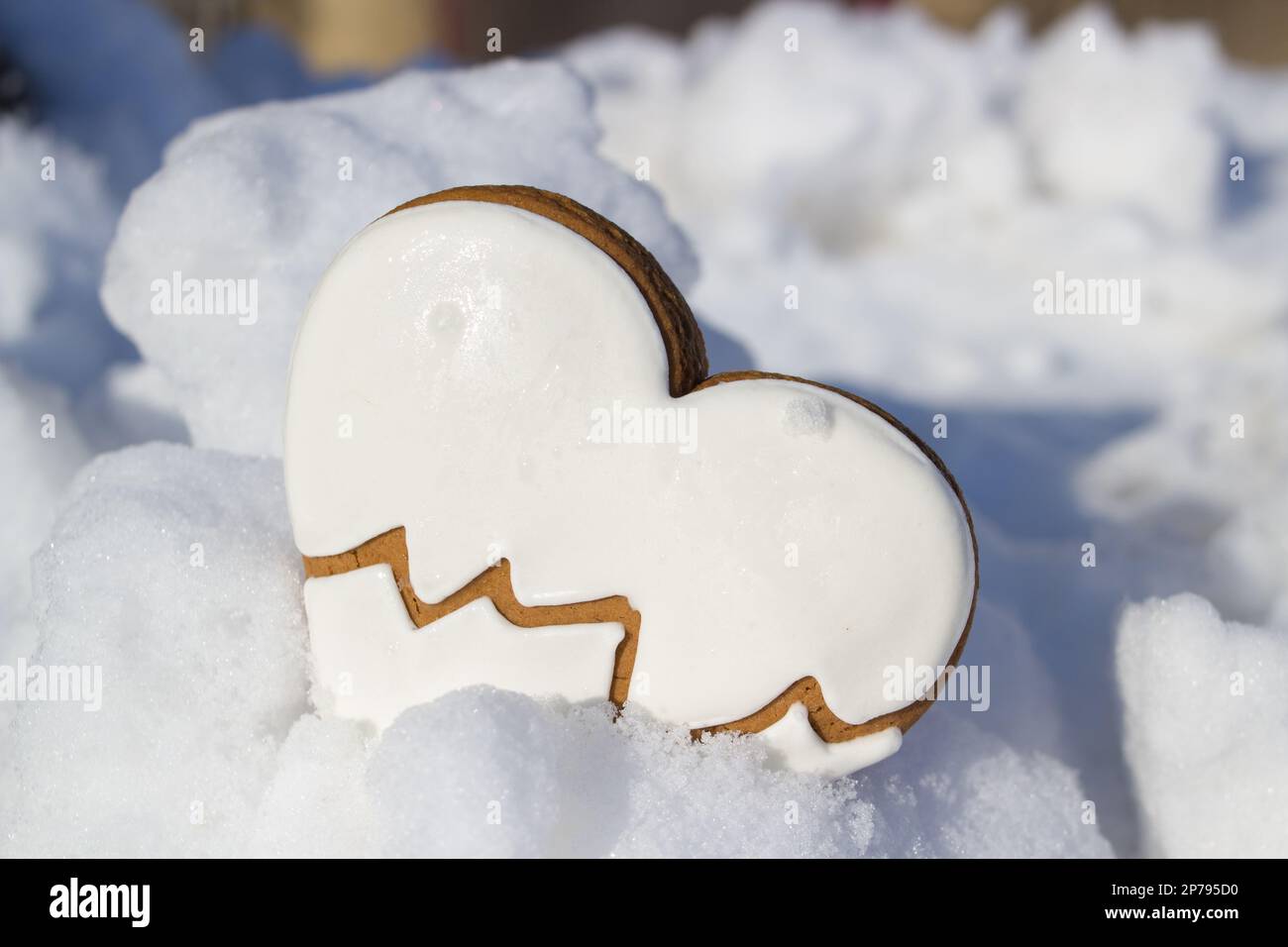 Snow heart in hands hi-res stock photography and images - Alamy