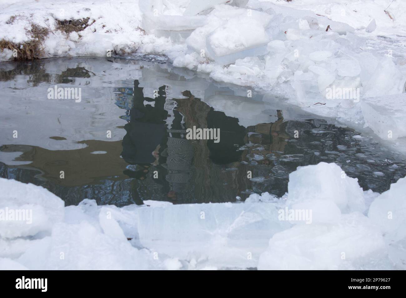 Winter hole frozen lake with snow and ice Stock Photo - Alamy